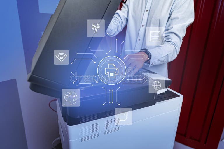 Technician Working at a Modern Multifunction Printer in an Office ...