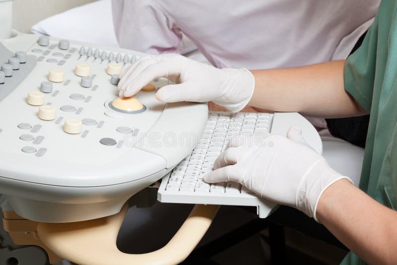Technician Operating Ultrasound Machine Stock Photo - Image of detail ...