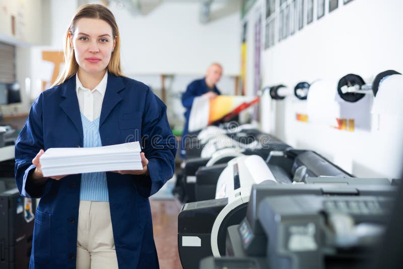 Technician Operator Changes Paper on Printer Plotter Machine Stock ... Technician Operator Changes Paper on Printer Plotter Machine Stock ...