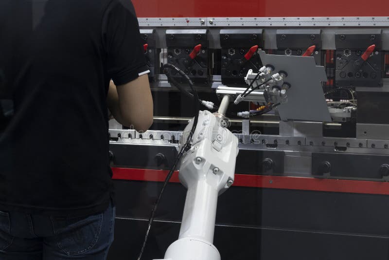 The Technician Operator Repair the Robotic System with Hydraulic Press ...