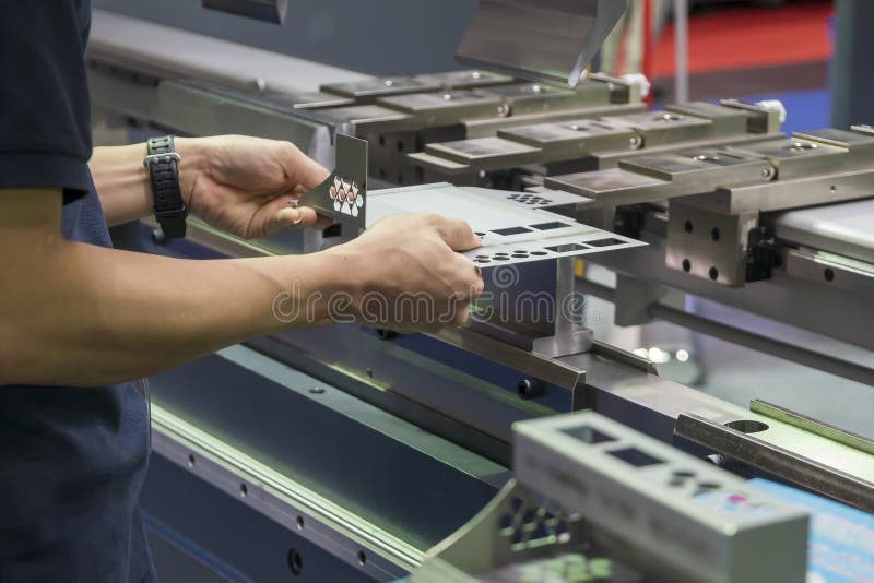 The Technician Operator Working with Press Brake Hydraulic Bending ...