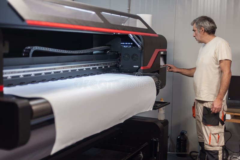 Technician Operator Works on Large Premium Industrial Printer Plotter ...