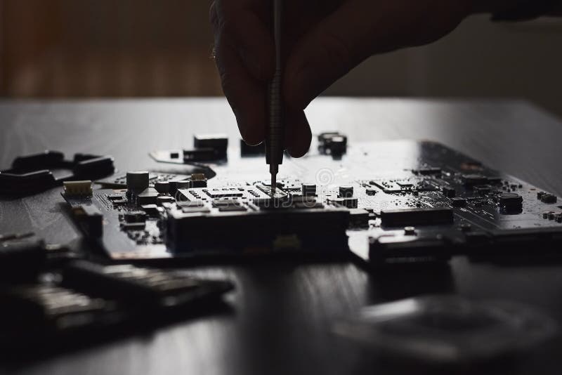 Technician Plug in CPU Microprocessor To Computer Motherboard Stock ...