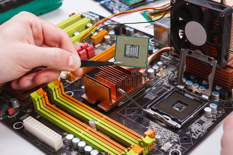 Technician Plug in Microprocessor To Motherboard Stock Image - Image of ...