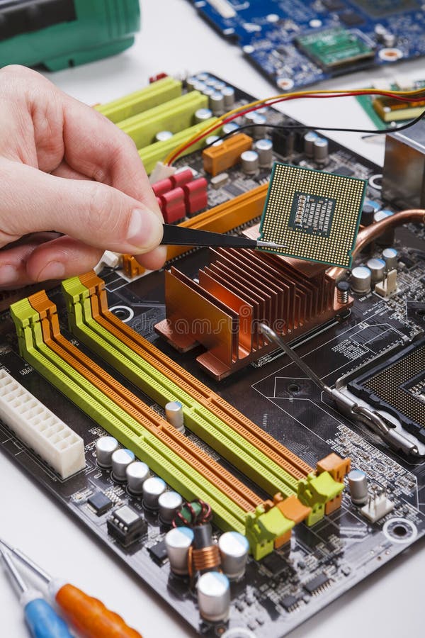 Technician Plug in Microprocessor To Motherboard Stock Image - Image of ...