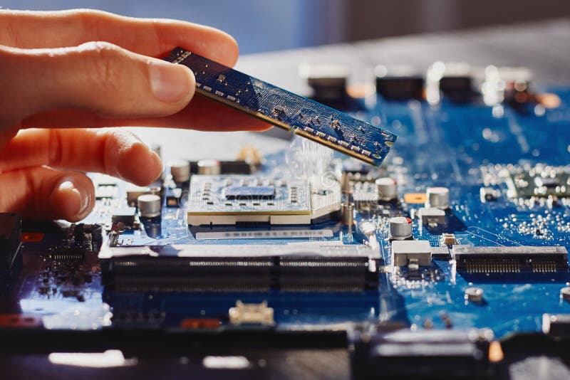 Technician Plug in CPU Microprocessor To Computer Motherboard Stock ...