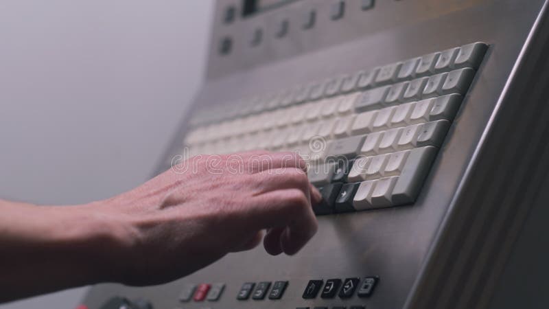 Technician Prepares Lathe Machine for Processing Using CNC Stock ...