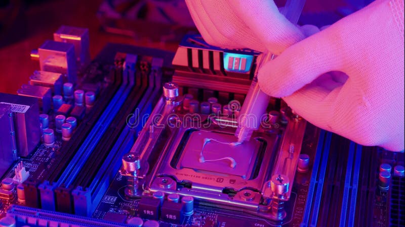 Technician Put Thermal Paste on CPU into the Motherboard Socket Stock ...