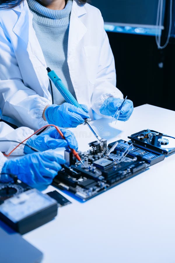 The Technician is Putting the CPU on the Socket of the Computer ...