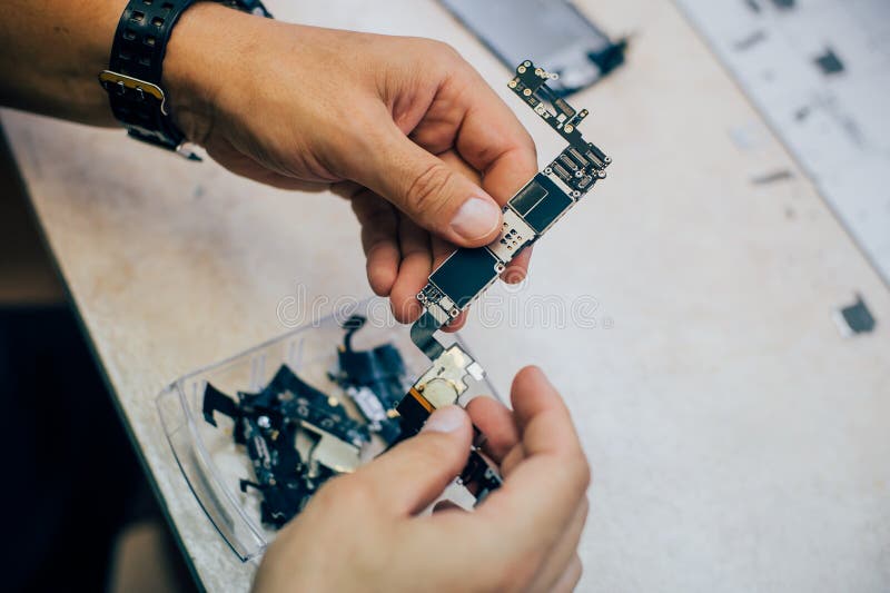 Technician Repair Faulty Mobile Phone in Electronic Smartphone T Stock ...