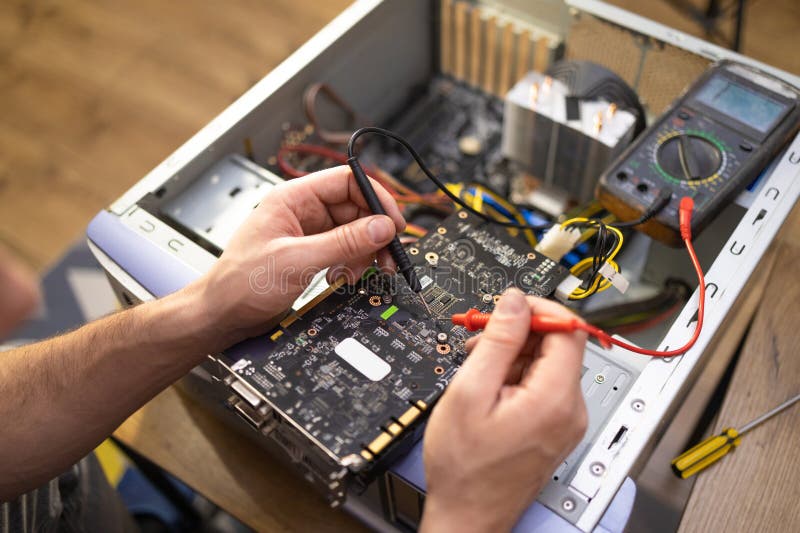 Technician Repairing a Broken Computer in a Workshop, Close-up Stock ...
