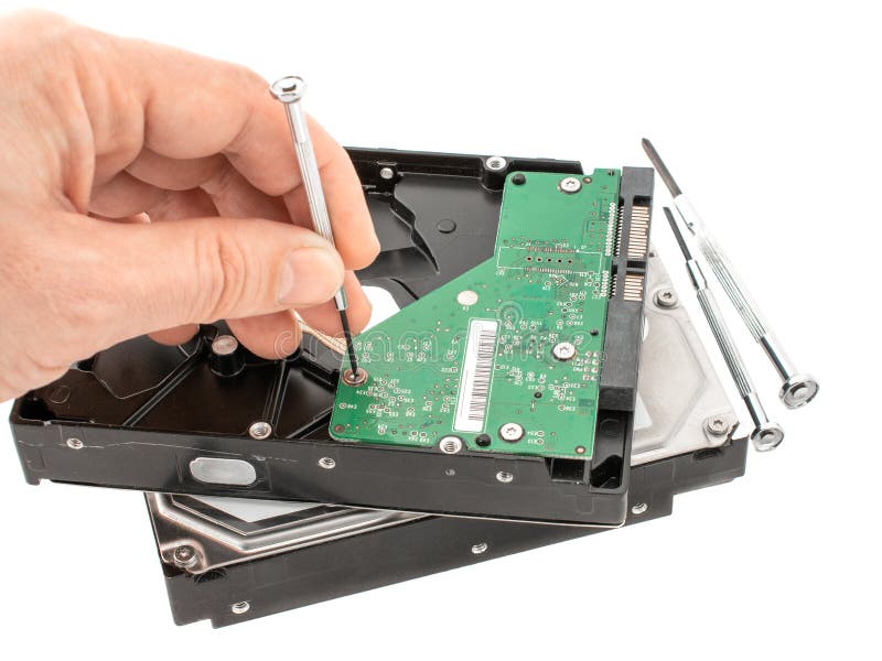 Technician Repairing Broken Hard Disk. Set of Screwdrivers for Repair ... Technician Repairing Broken Hard Disk. Set of Screwdrivers for Repair ...