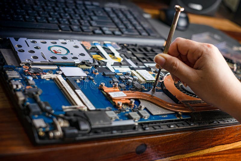 Hand Dismantle the Laptop. Laptop Repair with a Screwdriver Stock Image ... Hand Dismantle the Laptop. Laptop Repair with a Screwdriver Stock Image ...