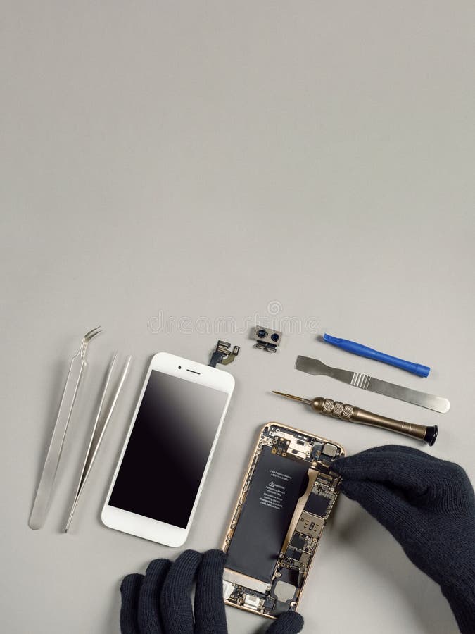 Technician Repairing Broken Smartphone on Desk Stock Image - Image of ...