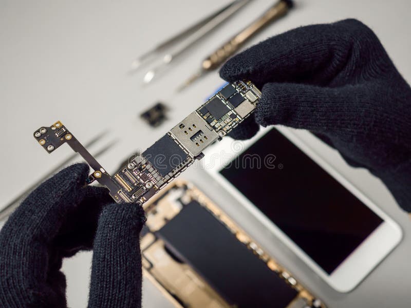 Technician Repairing Broken Smartphone on Desk Stock Image - Image of ...