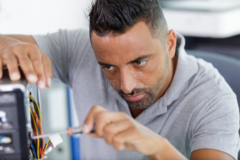 Technician Repairing Computer Stock Photo - Image of information ...