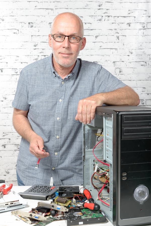A Technician Repairing a Computer Stock Image - Image of working ...