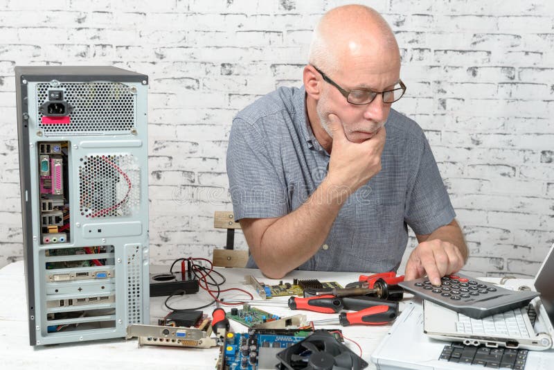 A Technician Repairing a Computer Stock Photo - Image of caucasian ...
