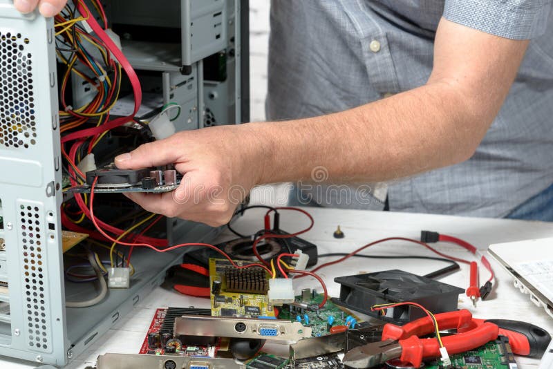 A Technician Repairing a Computer Stock Photo - Image of fixing ...