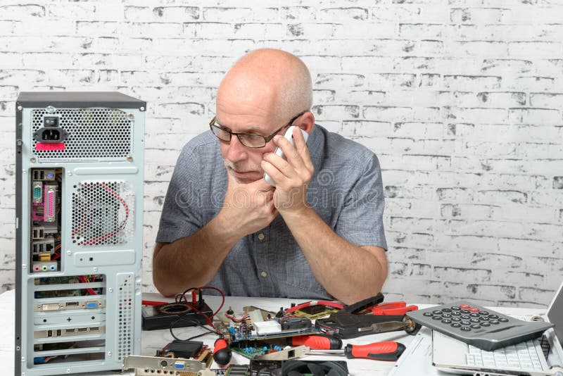 A Technician Repairing a Computer Stock Photo - Image of screen, person ...