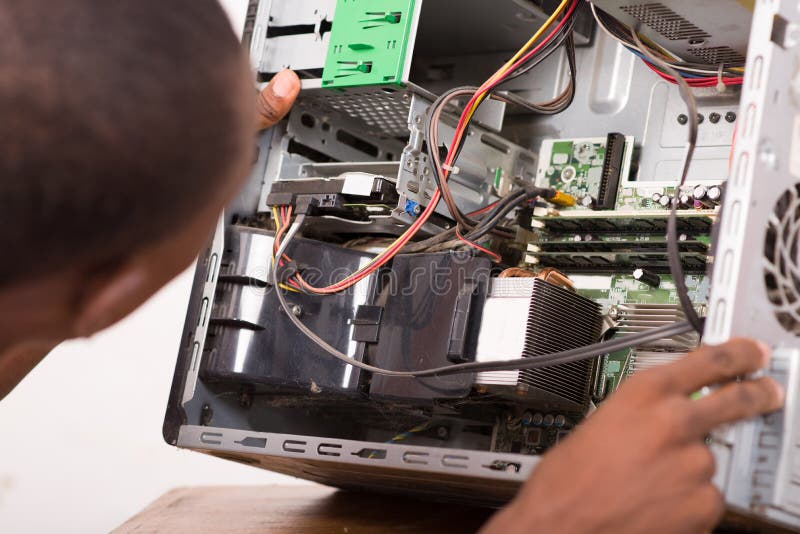 Technician Repairing Computer Equipment Stock Photo - Image of abidjan ...
