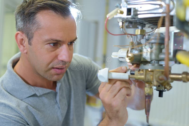 Technician Repairing Electric Boiler Stock Image - Image of boiler ...
