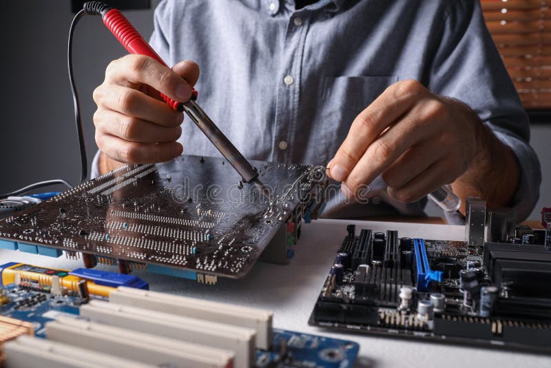 Repairing Electronic Circuitry Stock Image - Image of people ...
