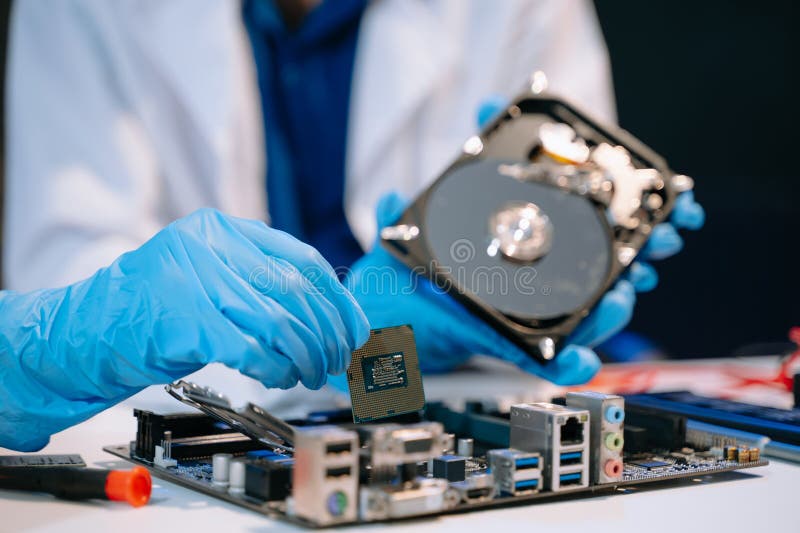 Technician Repairing Inside of Hard Disk Drive by Screwdriver. the ...