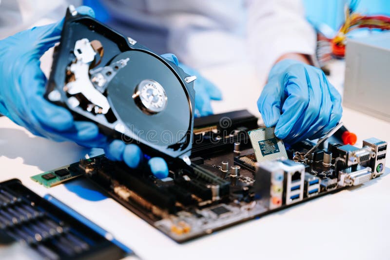 Technician Repairing Inside of Hard Disk Drive by Screwdriver. the ...