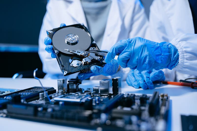 Technician Repairing Inside of Hard Disk Drive by Screwdriver. the ...