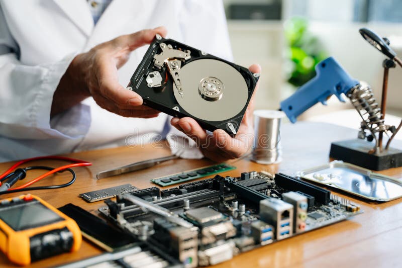 Technician Repairing Inside of Hard Disk Drive by Screwdriver. the ...