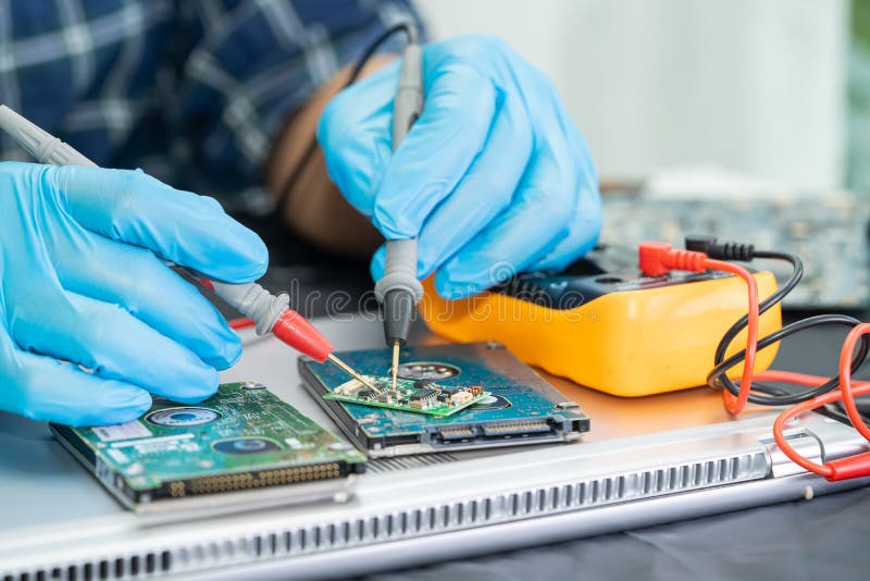 Technician Repairing Inside of Mobile Phone by Soldering Iron ...