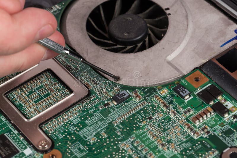 Technician Repairing Laptop at Desk Stock Photo - Image of electronic ...