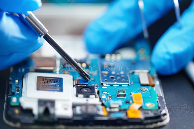 Technician Repairing Micro Circuit Main Board of Smartphone Stock Image ...