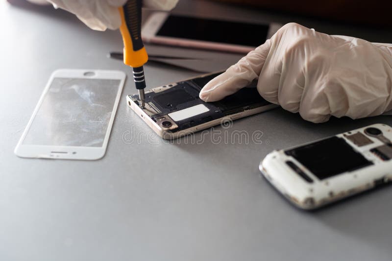 The Technician Repairing the Smartphone S Motherboard in the Lab with ...
