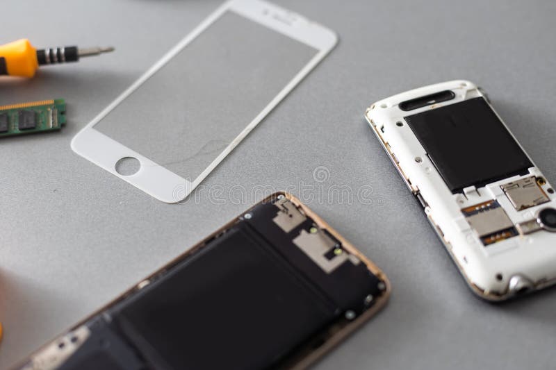 The Technician Repairing the Smartphone S Motherboard in the Lab with ...