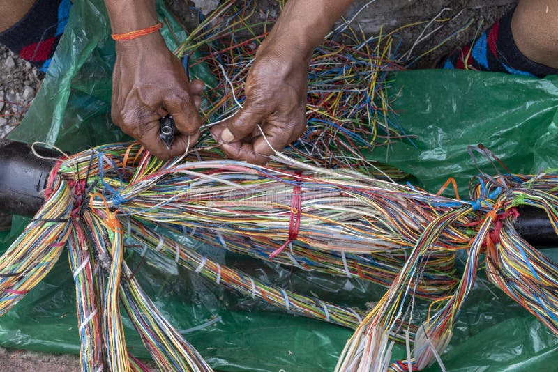 Technician Repairing an Underground Telephone Line Multicolored Wires ...