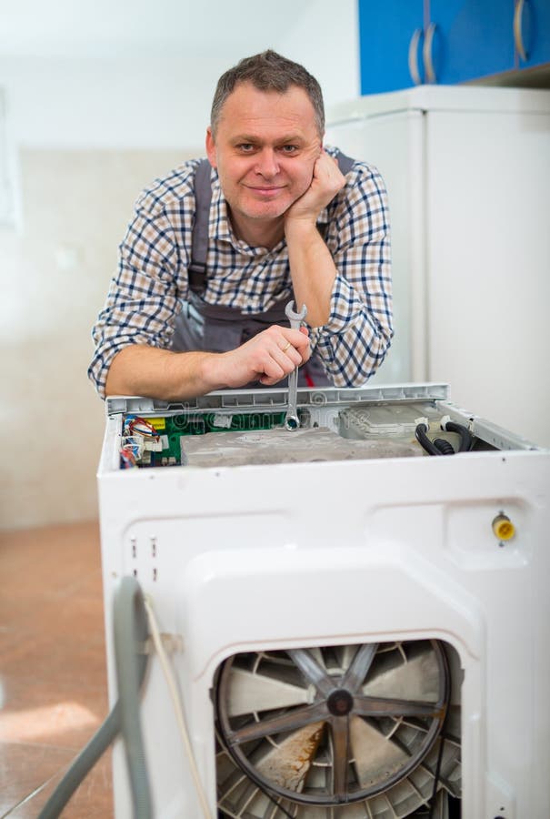 Technician Repairing a Washing Machine Stock Image - Image of tool ...