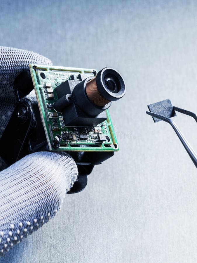 Engineer Installing Microchip in CCTV Camera Stock Image - Image of ...
