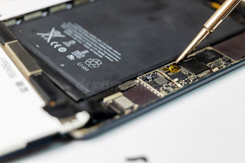 Technician Repairs Damaged Tablet with Precision Tools Stock Photo ...