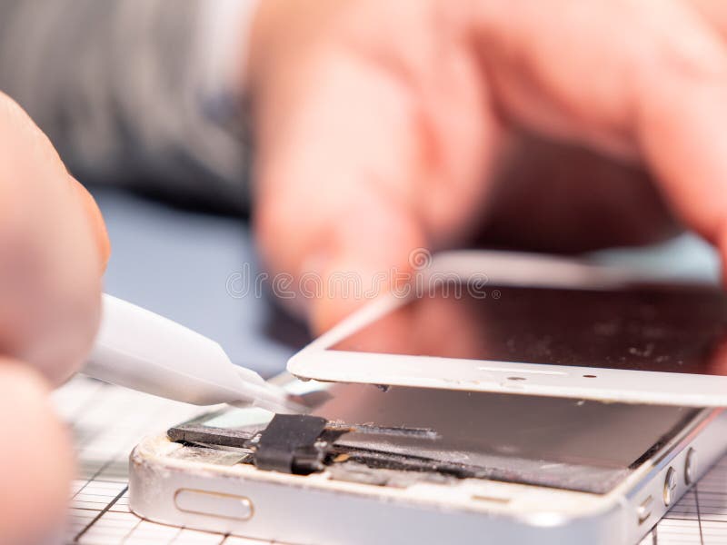 A Technician Repairs a Smartphone in a Laboratory with Copy Space ...