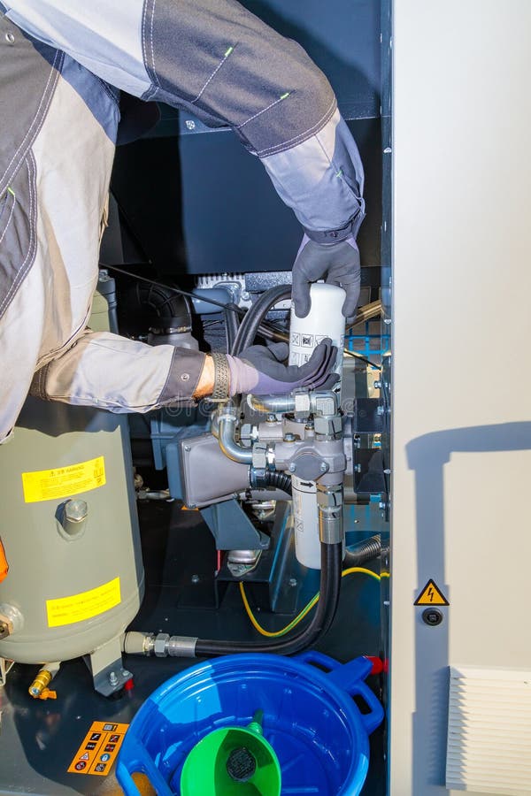 Industrial Maintenance Technician Changing Filter of a Large Air ...