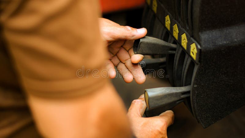 Technician Hand is Controlling the Lifting Crane on the Car Stock Photo ...