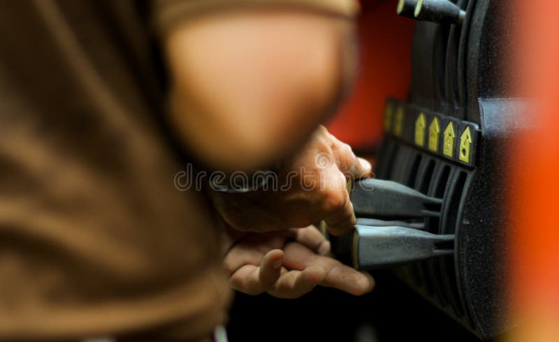 Technician Hand is Controlling the Lifting Crane on the Car Stock Image ...