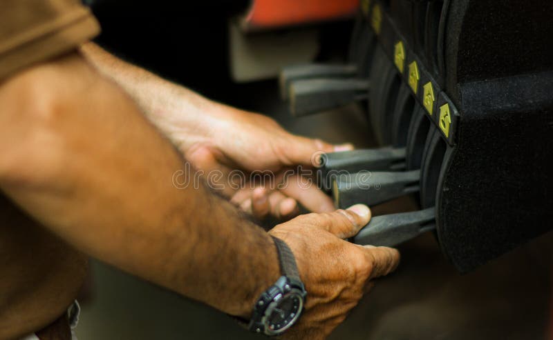 Technician Hand is Controlling the Lifting Crane on the Car Stock Image ...