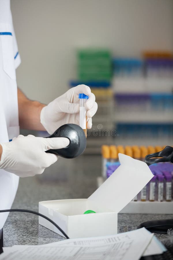 Technician Scanning Barcode on Medical Sample Stock Photo - Image of ...