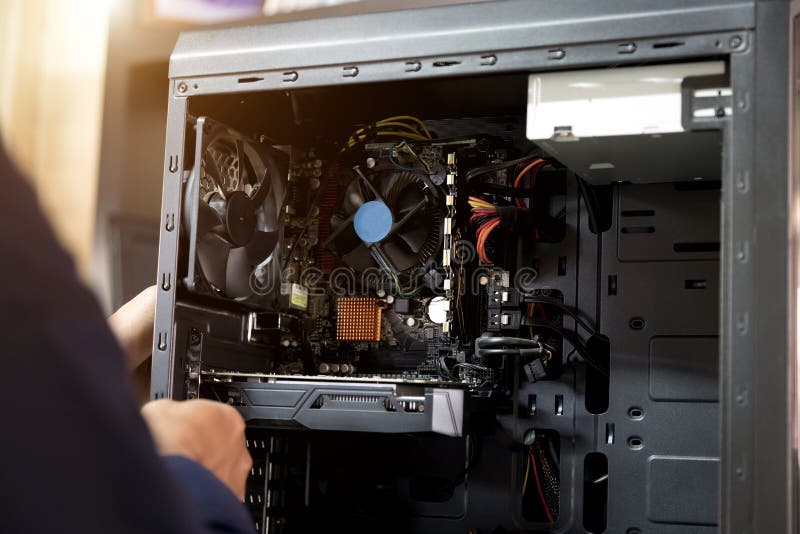 Technician with a Screwdriver for Fixing Computers, Computer Har Stock ...