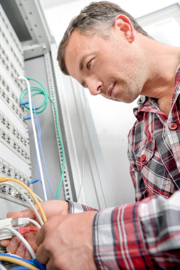Technician in server room stock photo. Image of communications - 101442256