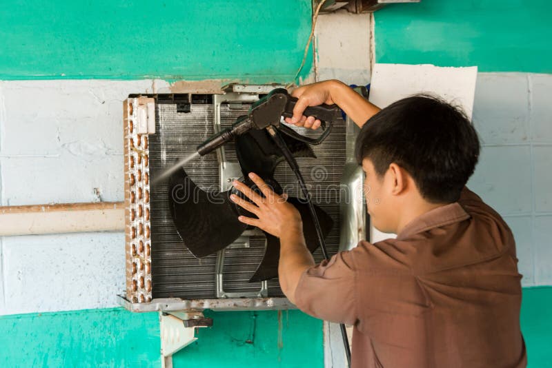 Repairing AC Compressor stock image. Image of helmet, professional ...