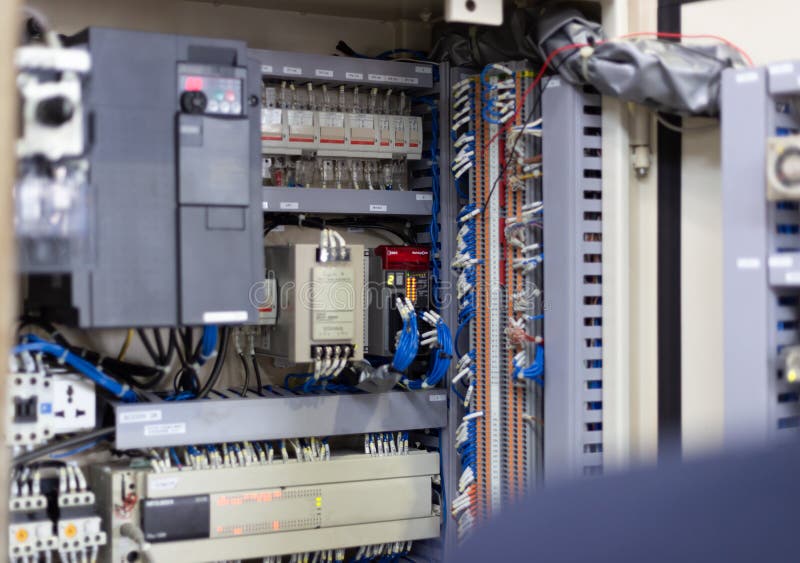 Technician Setting Electric Control Box of Machine in Factory Stock ...